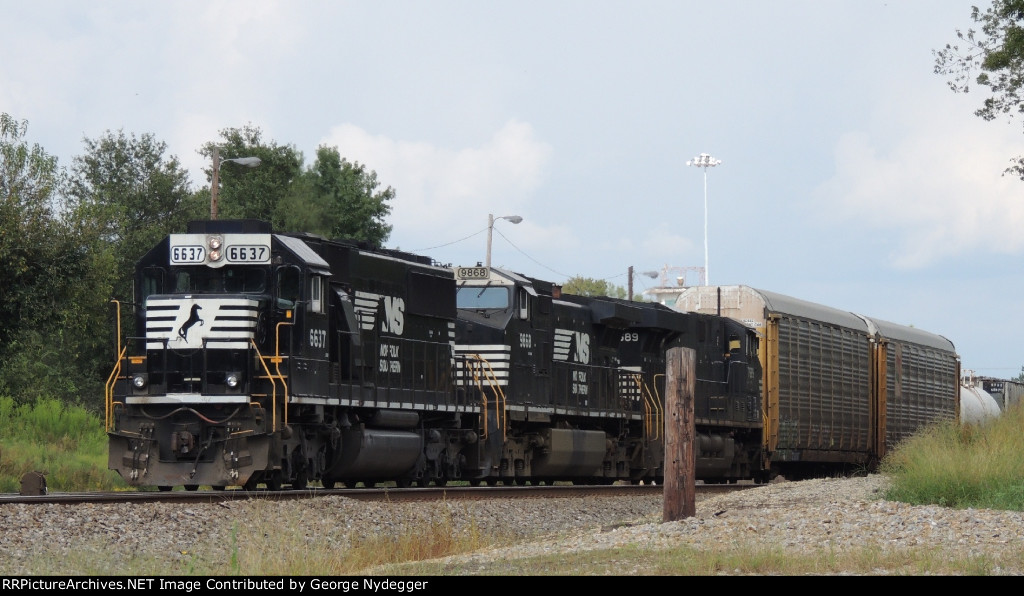 NS 6637 (SD60) & NS 9868 (C40-9W) pulling a mixed freight train